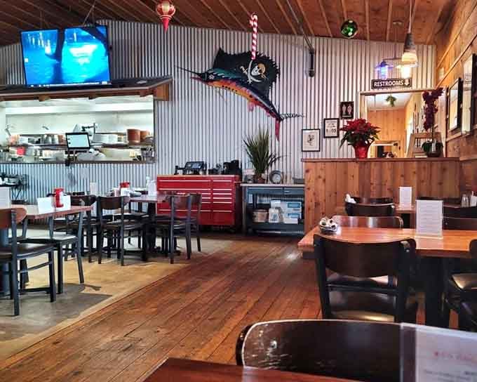 Red toolboxes and nautical flags add quirky personality to a dining room that refuses to take itself too seriously.