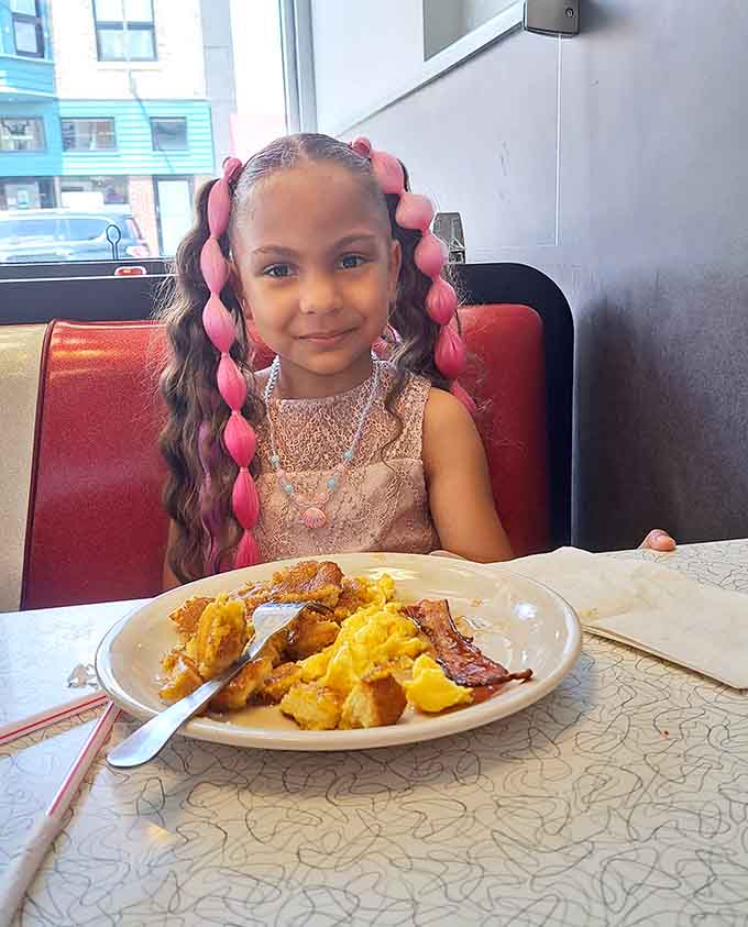 Young diners learning early that great breakfast spots are treasures worth remembering for a lifetime ahead.