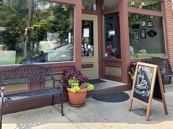 The entrance bench and welcoming chalkboard sign invite you to pause before entering breakfast paradise.