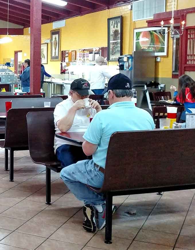 Real people enjoying real food in a real restaurant, no filters or fancy plating required here.