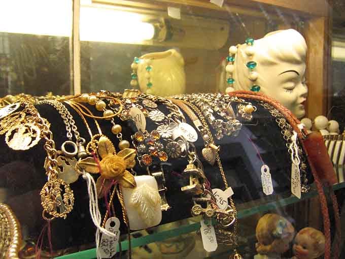 Jewelry displays glittering with pieces that have adorned necks and wrists through decades of dinner parties.
