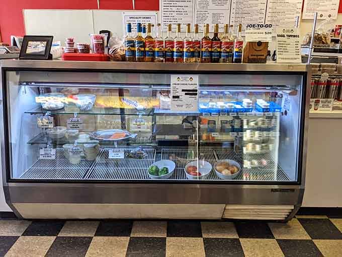 The display case showcases fresh bagels and spreads, tempting you with options that all look equally irresistible.