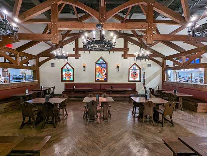 Timber trusses overhead and heraldic stained glass windows make eating cheese feel downright ceremonial and special.