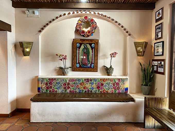 Colorful Talavera tiles and religious iconography create an atmosphere that feels both reverent and wonderfully welcoming to all.
