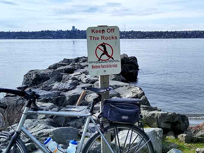 Even paradise has rules, but at least these rocks are honest about wanting you to stay safe.