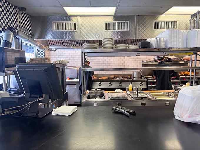 Behind the scenes, the kitchen hums with the organized chaos that produces consistently excellent diner food.