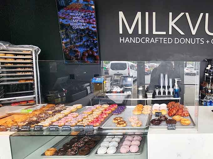 The donut case display that launches a thousand cravings and makes every diet start on Monday instead of today.