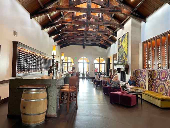 A wine wall that holds more bottles than most people's entire life collection, displayed like liquid artwork on shelves.