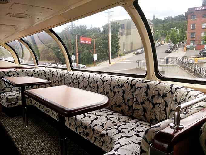Dome car seating with floral upholstery that somehow makes you feel fancy and comfortable at the exact same time.