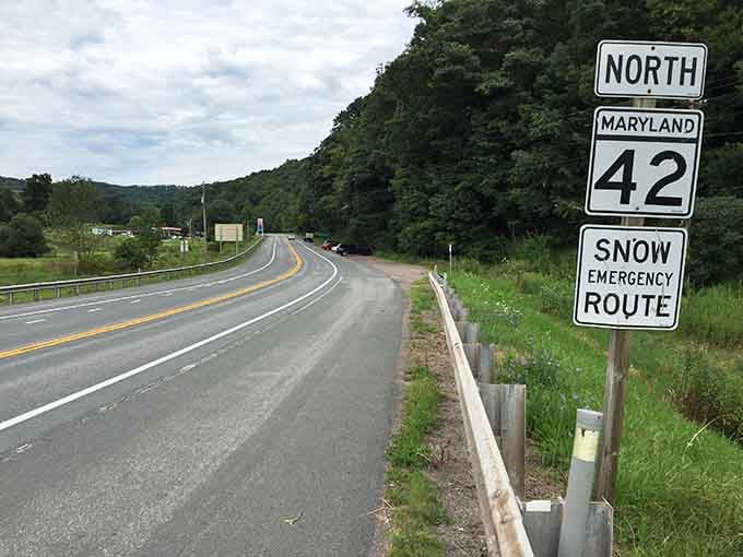 Route 42 curves through green hills like a ribbon on the world's most beautiful gift package.