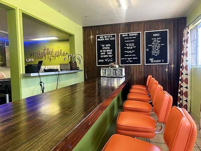 Orange counter seats and retro vibes remind you that good food never goes out of fashion, period.