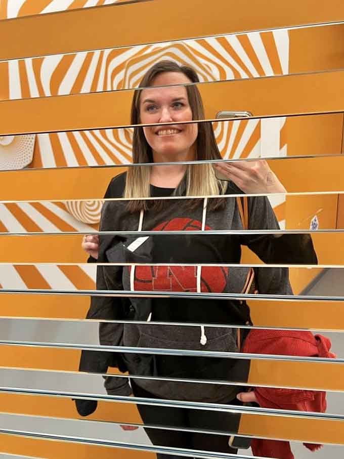 Those mirror strips slice you into segments like a magic trick gone wonderfully right instead of horribly wrong.