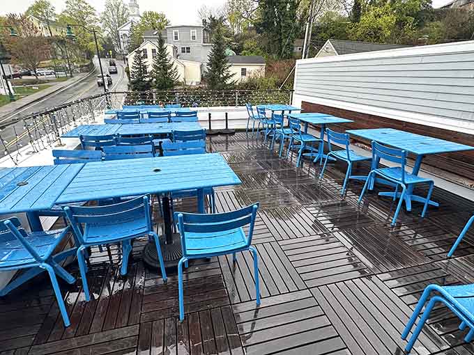 The rooftop patio offers fresh air and blue skies, perfect for enjoying your pizza with a side of sunshine.