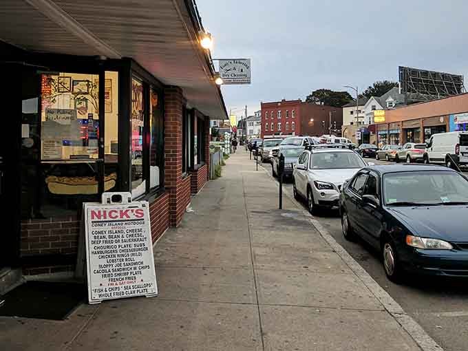 That unassuming storefront on South Main Street hides over a century of hot dog perfection and community gathering inside.