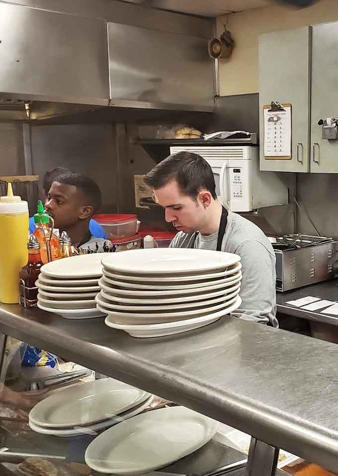 Behind every great sandwich is a team working faster than a pit crew at the Daytona 500.