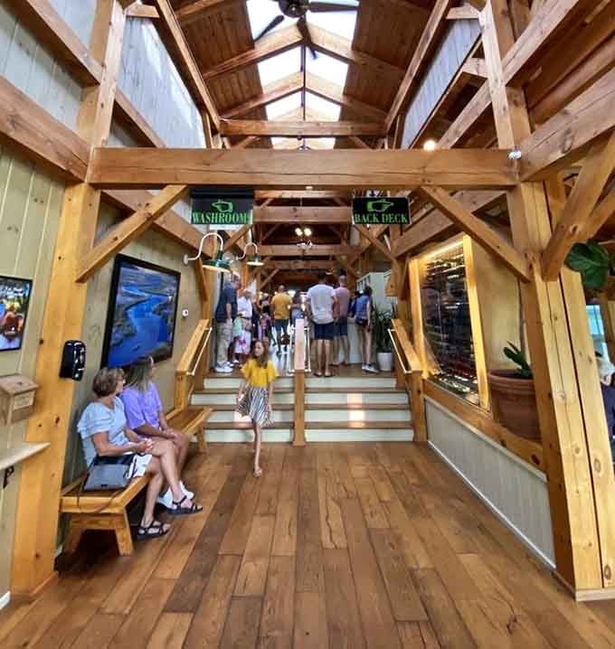 Even the waiting area offers water views, proving this place understands that anticipation should come with scenery.