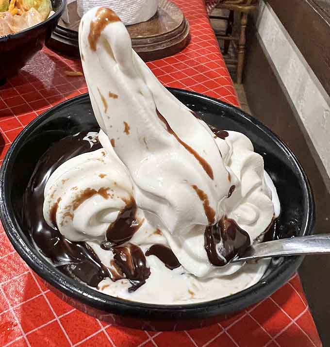 Soft serve sundae with sauce swirls: the sweet finale that proves Ole South knows how to end things right.