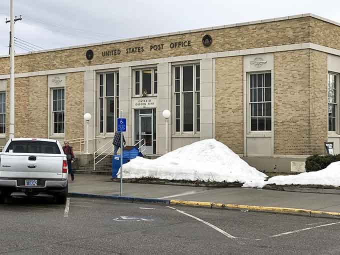 Classic federal architecture with towering columns reminds us when post offices were built like temples to public service.