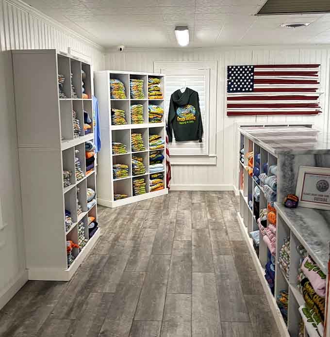 Shelves stocked with colorful merchandise and that wooden flag remind you that supporting local never looked so good.