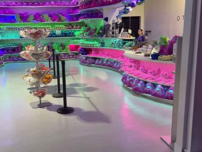 The gift shop glows like a candy store designed by someone from the future.