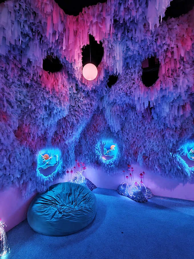 Icicle formations in pink and blue create a frozen grotto that's somehow warm and inviting.