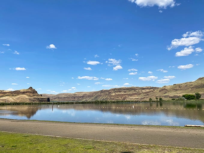 The swimming area provides relief from summer heat, though the scenery might leave you too distracted to swim.
