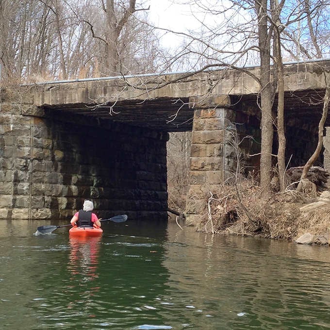 Kayaking past old stone ruins turns a simple paddle into a time-traveling adventure with better exercise.