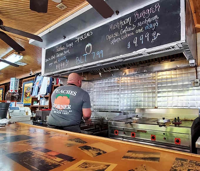 Behind the scenes, the kitchen crew works the griddle with the precision of seasoned diner veterans.