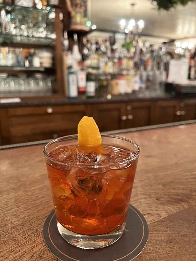 That Old Fashioned looks like liquid amber perfection, the ideal companion while you contemplate your upcoming steak selection.