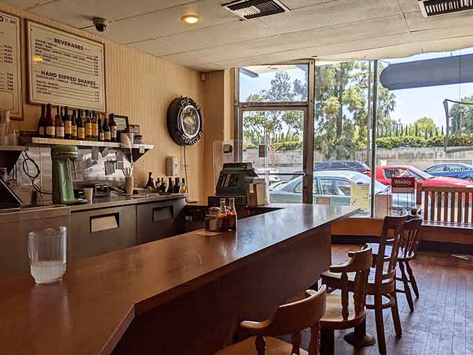Counter seats with a view of the griddle, where you can watch your burger dreams become delicious reality.