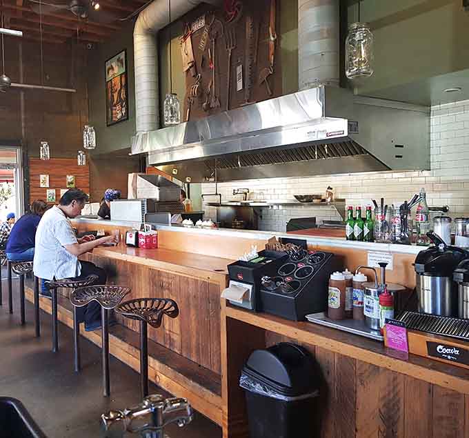 Wood and metal create warmth in a space designed for serious eating and zero pretension whatsoever here.