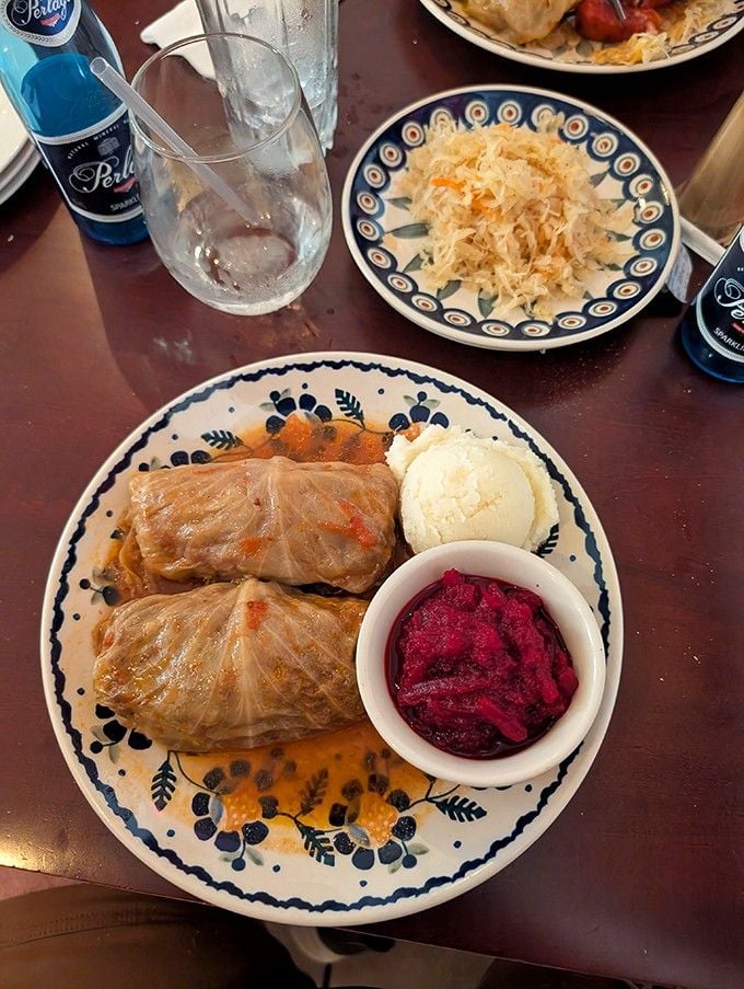 Cabbage rolls stuffed with love and served with cranberry sauce, proving vegetables can be deeply, profoundly satisfying comfort.