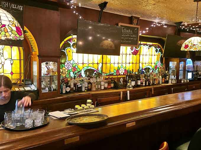 The bar area features stunning stained glass that would make any church jealous of its beauty.