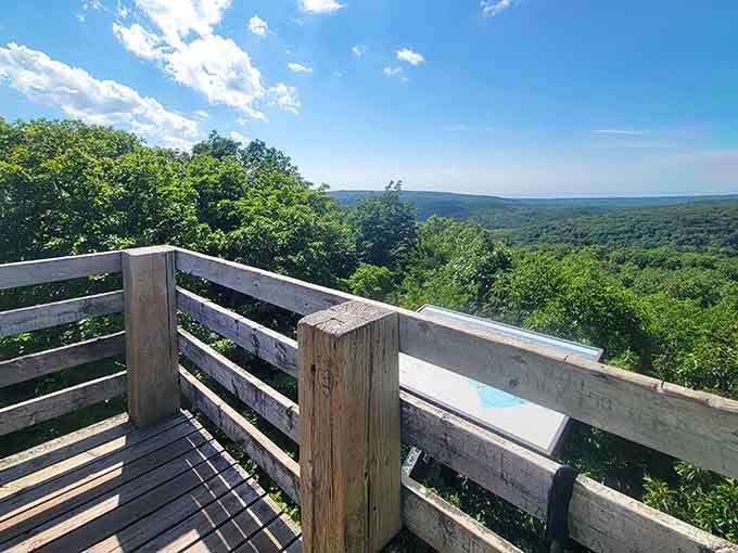 The overlook deck where countless visitors have stood speechless, cameras clicking, hearts full of unexpected wonder.