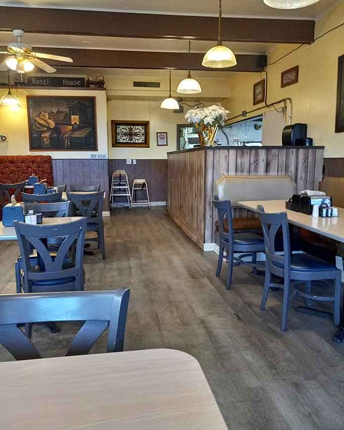 The rustic wood paneling and warm lighting remind you of simpler times when diners were community gathering spots.