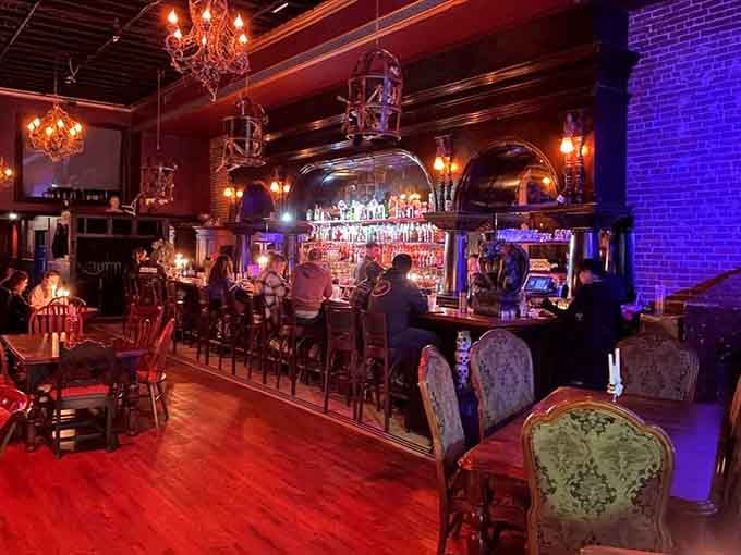 The bar glows with an otherworldly light, beckoning patrons to belly up and order something wonderfully wicked.