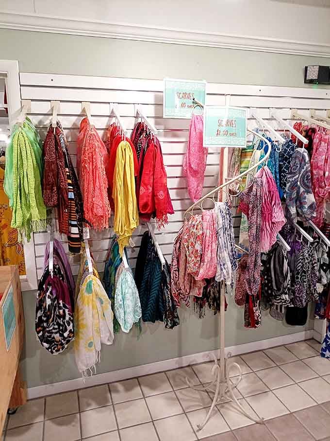 Scarves in every color imaginable, ready to add flair to any outfit like fabric exclamation points.
