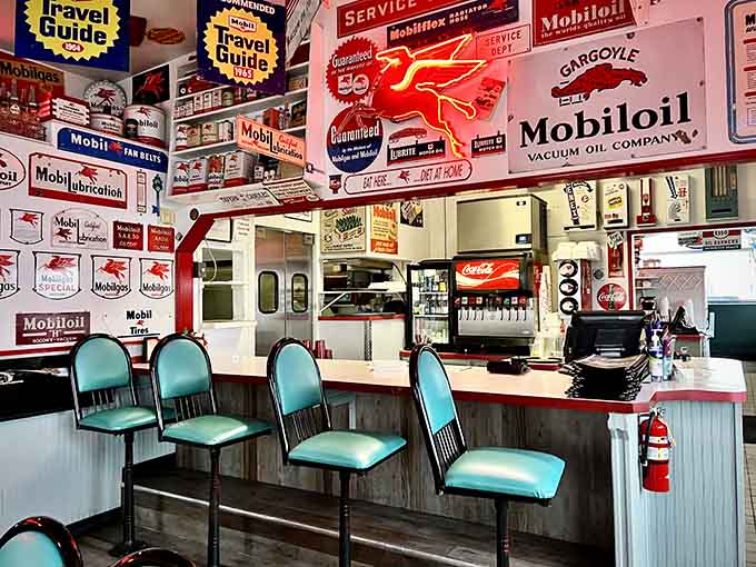 That counter seating puts you right in the action, surrounded by enough vintage signs to fuel serious nostalgia.