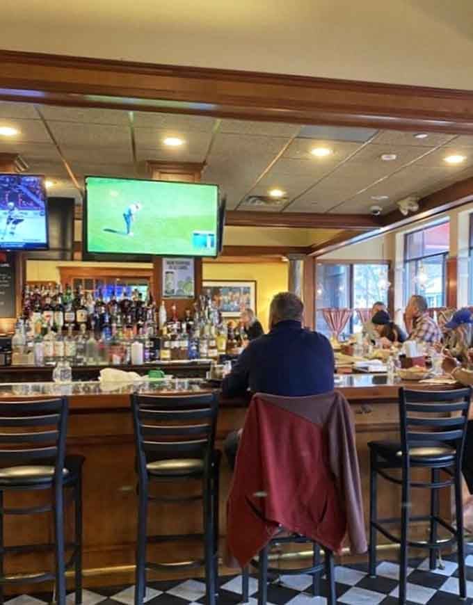 The well-stocked bar area means you can enjoy a proper drink while waiting for your rectangular masterpiece.