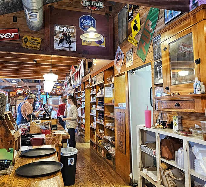 The view through the kitchen window reveals dedicated folks turning raw ingredients into the smoky magic that keeps people coming back.