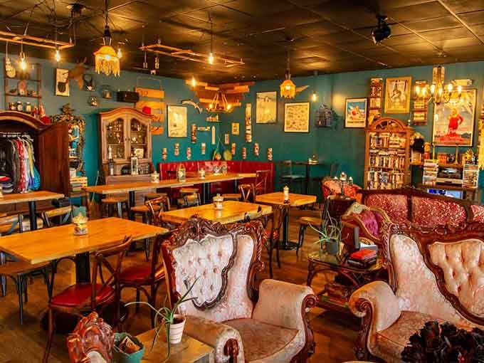 Victorian sofas meeting modern dining in a mashup that somehow works better than it has any right to.