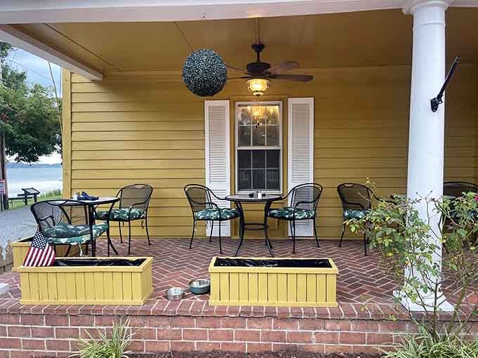 Porch seating where you can watch the river and pretend you're in a Jane Austen novel, minus the corsets.