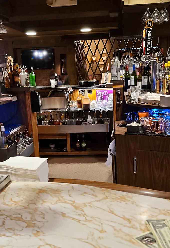 The bar area stocks everything you need for a proper Wisconsin cocktail, with bartenders who know their craft.