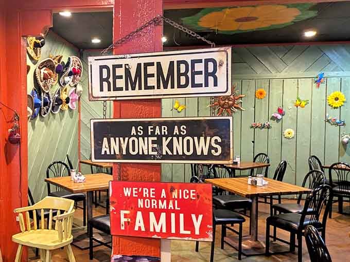 Humorous signs remind you that normal is overrated and family meals should always include laughter.