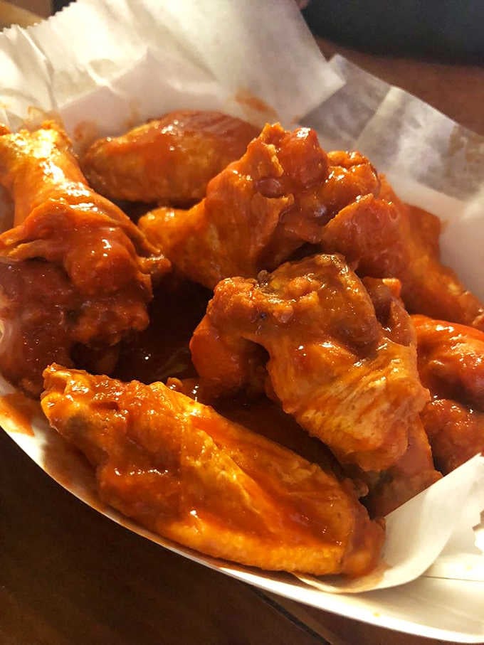 Hot wings glazed to sticky perfection, ready to make your taste buds dance and your napkin supply disappear completely.