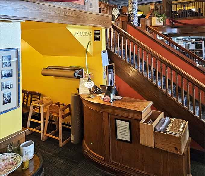 The host stand welcomes you with warm wood tones that whisper "you're in good hands here, friend."