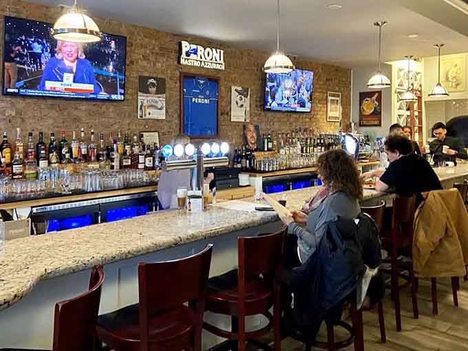 The bar area invites you to settle in with a drink while your pizza works its magic.
