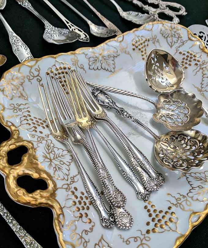 Sterling silver flatware on hand-painted china, because our grandparents knew how to make Tuesday dinner look like Sunday brunch.