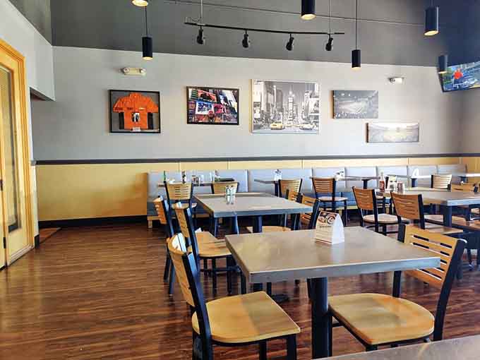 Framed photos on the walls give this dining room character while you contemplate your sandwich strategy ahead.