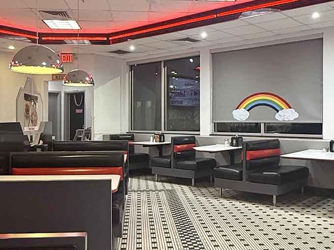 Rainbow decor and comfortable seating remind you that diners are community gathering spots, not just places to refuel between errands quickly.